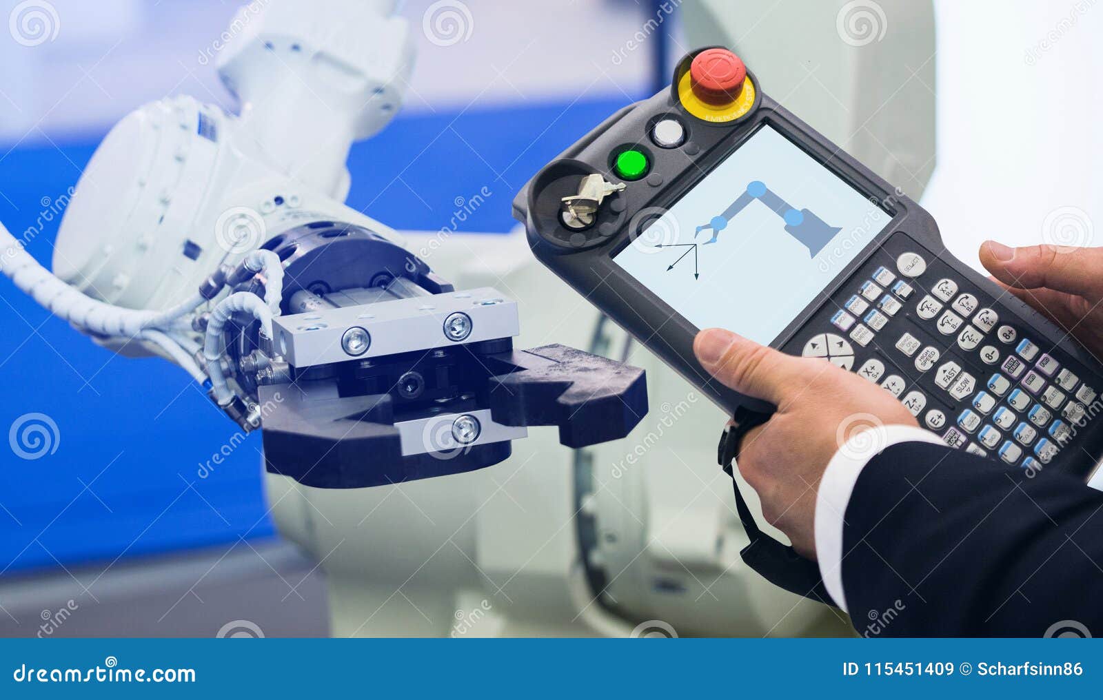 Engineer with Teach Pendant Device. Stock Image - Image of factory ... Engineer with Teach Pendant Device. Stock Image - Image of factory ...
