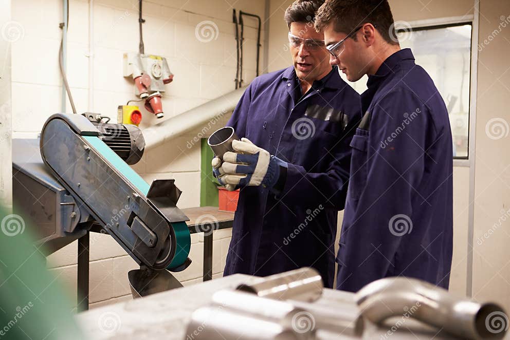Engineer Teaching Apprentice To Use Grinding Machi Stock Photo - Image ...