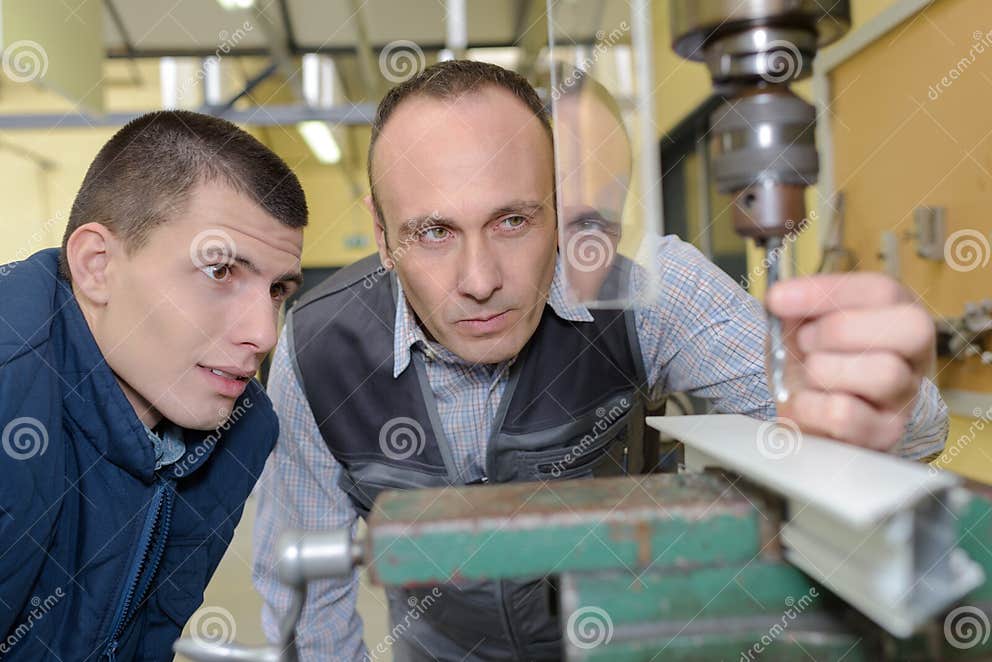 Engineer Teaching Apprentice To Use Milling Machine Stock Image - Image ...