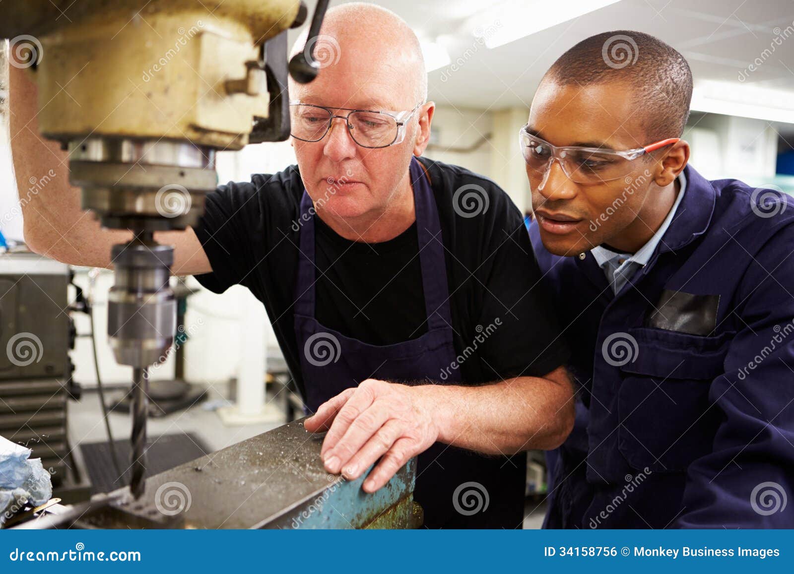 Engineer Teaching Apprentice To Use Milling Machine Stock Photo - Image ...