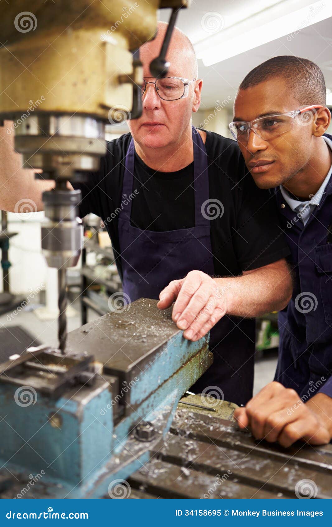 Engineer Teaching Apprentice To Use Milling Machine Stock Image - Image ...