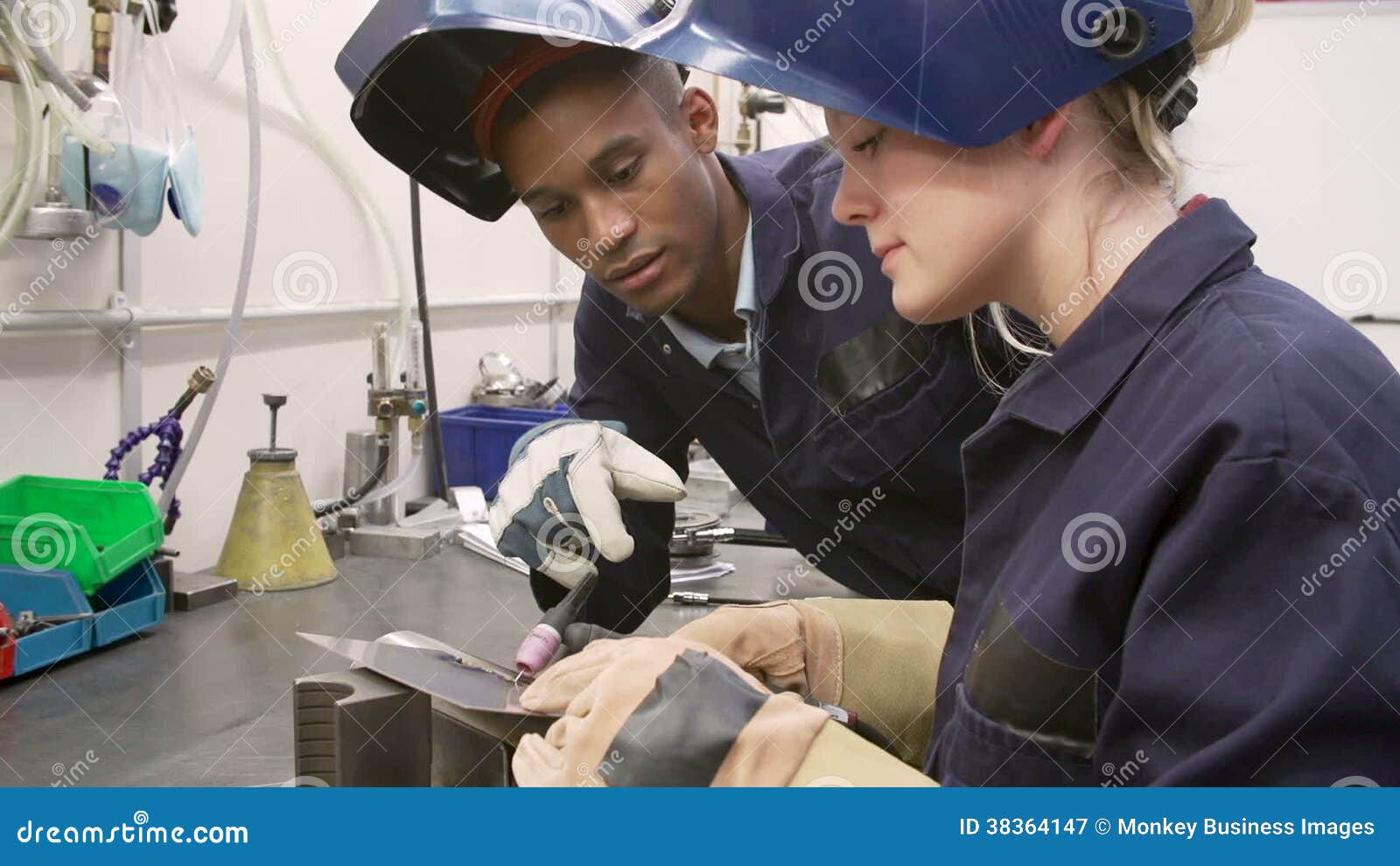 Engineer Teaching Apprentice To Use TIG Welding Machine Stock Footage ...