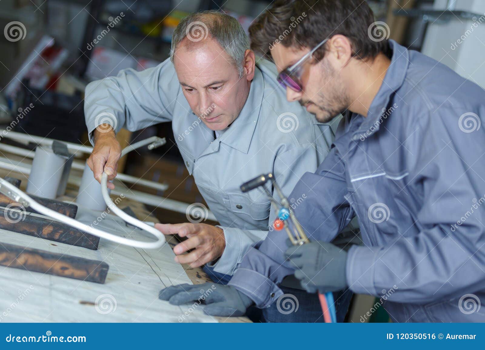 Engineer Teaching Apprentice To Use Tig Welding Machine Stock Photo ...