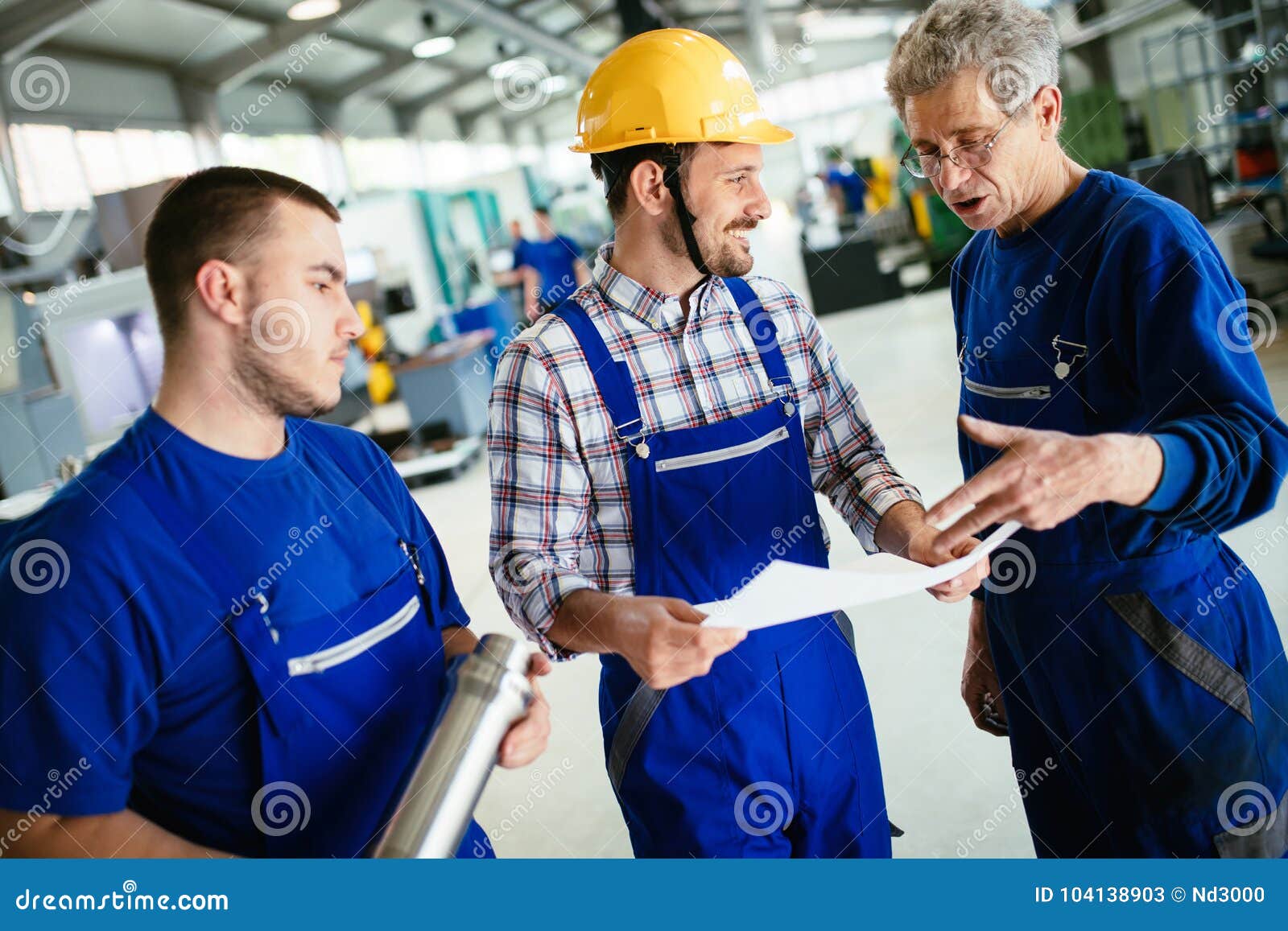 Engineer Teaching Apprentices To Use Computerized Cnc Metal Processing ...