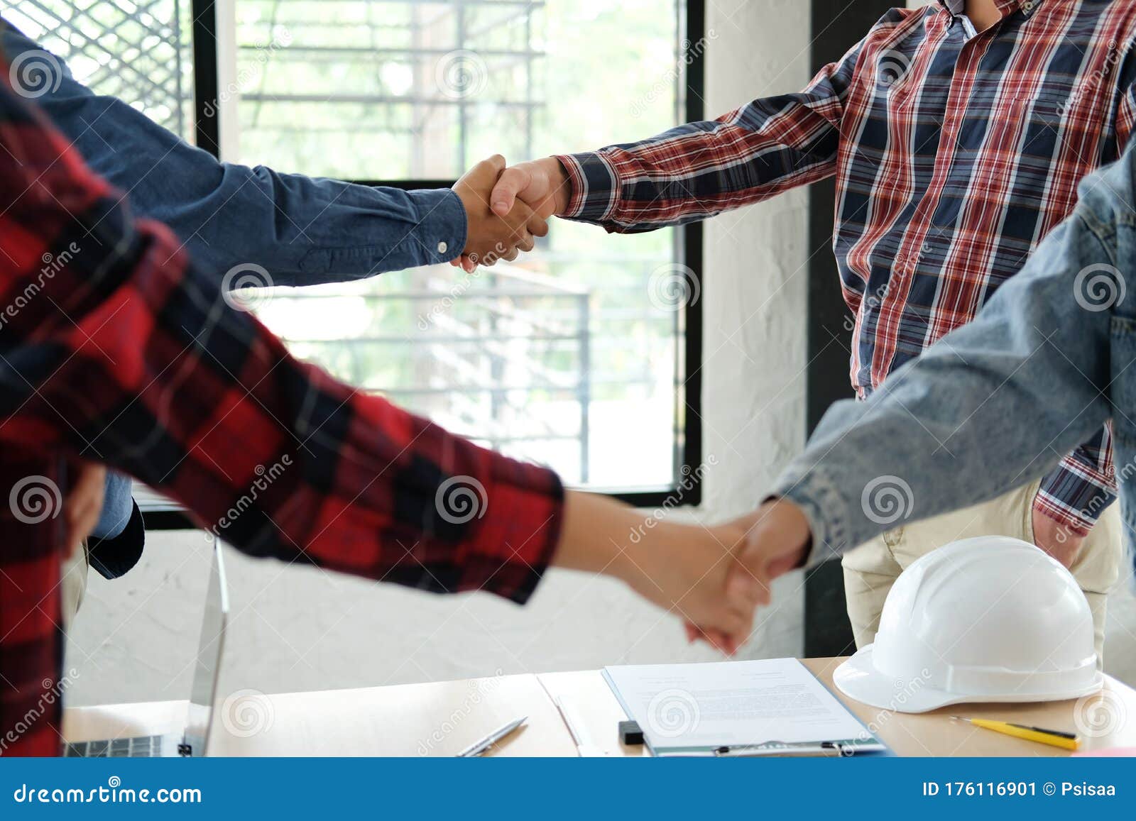 Engineer Team Handshaking. Architect Shaking Hands for Building ...