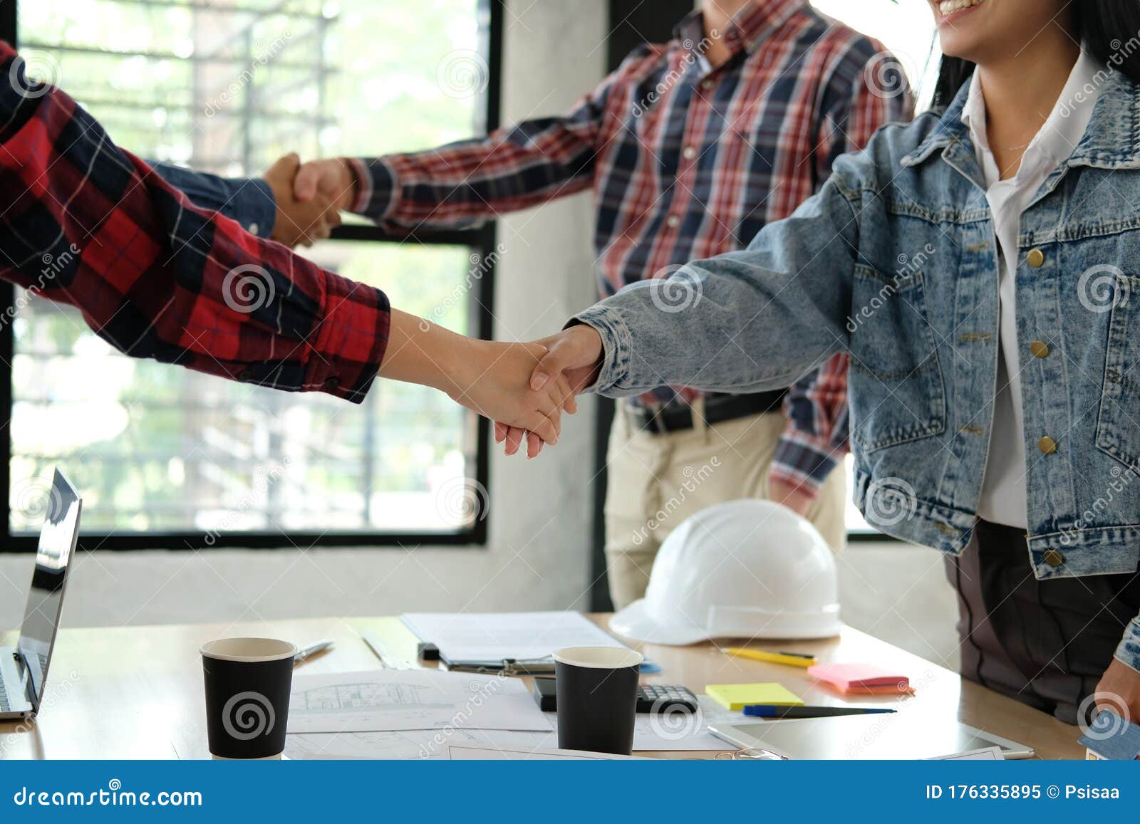 Engineer Team Handshaking. Architect Shaking Hands for Building ...