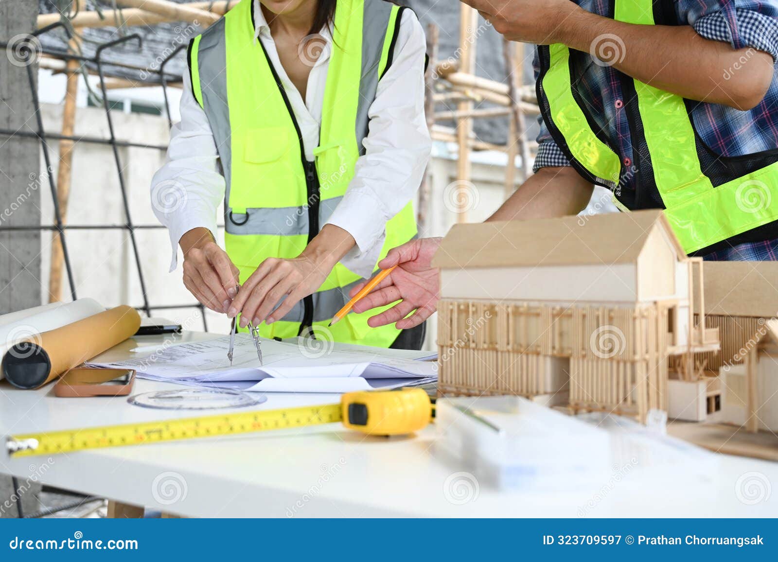 Engineer Team Having Briefing about Project Reviewing Blueprints at a ...
