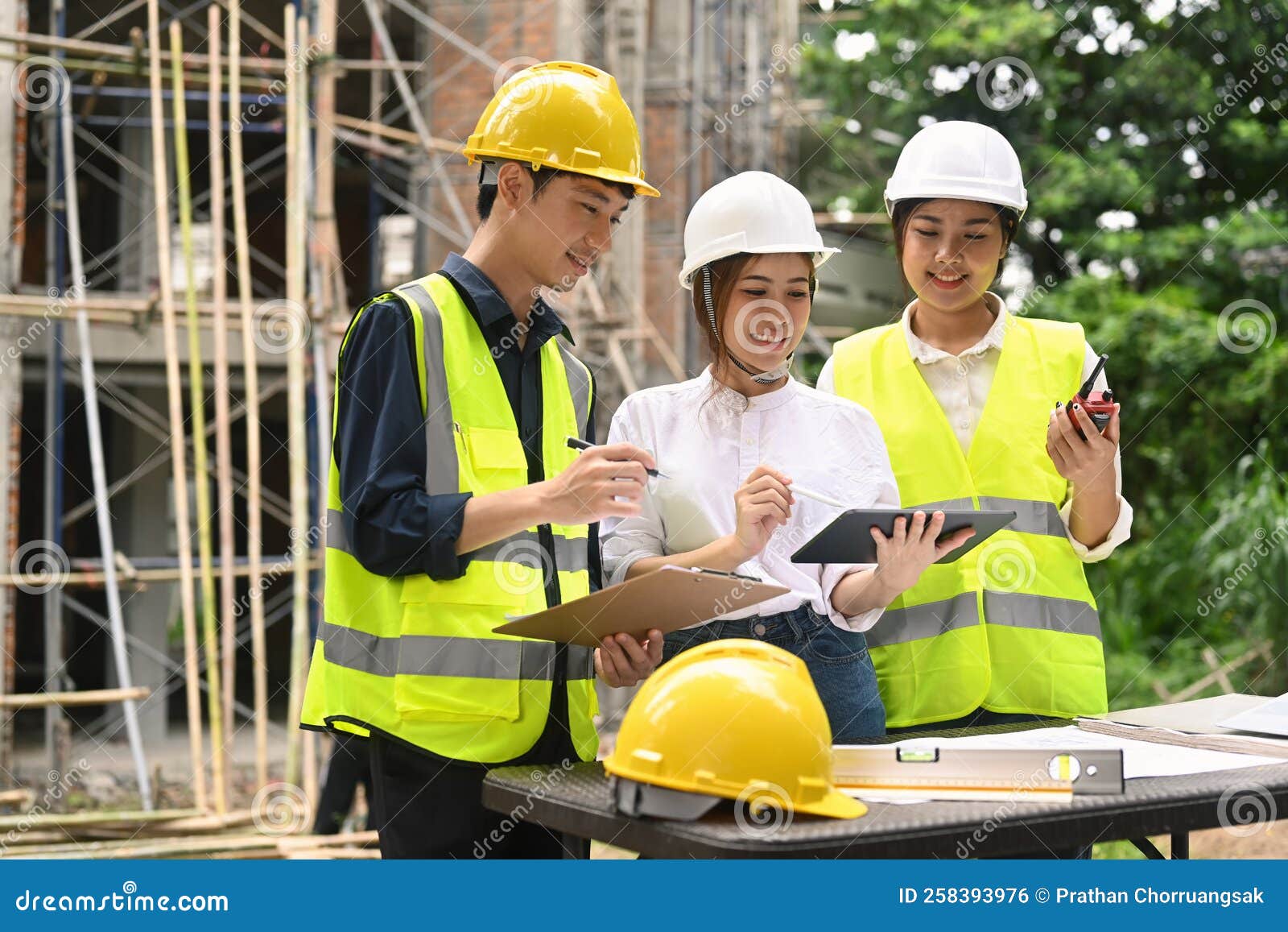 Engineer Team and Investor Using Digital Tablet, Discussing Plan ...