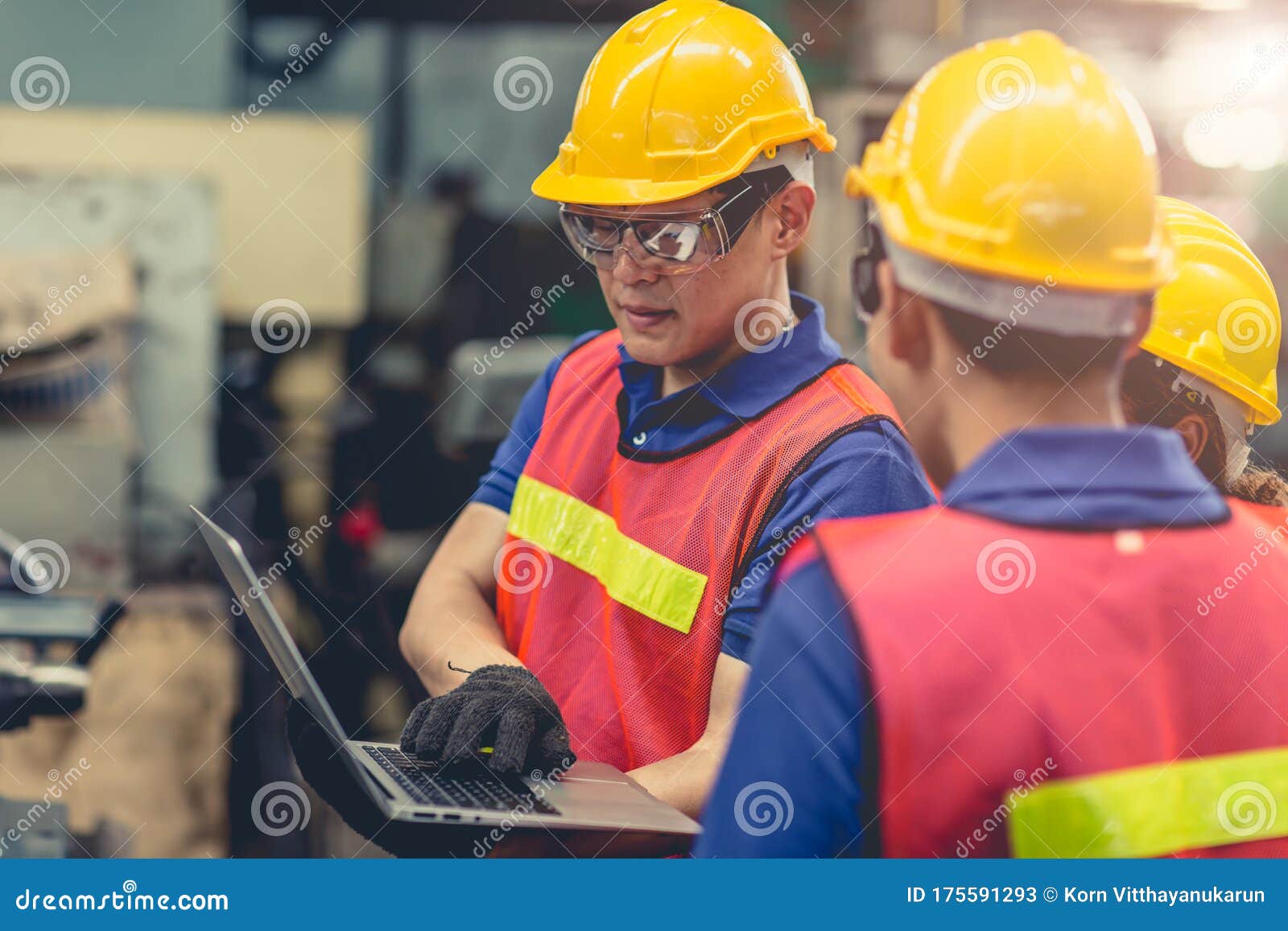 Engineer Team Mix Race Working Together in Heavy Industry with Laptop ...