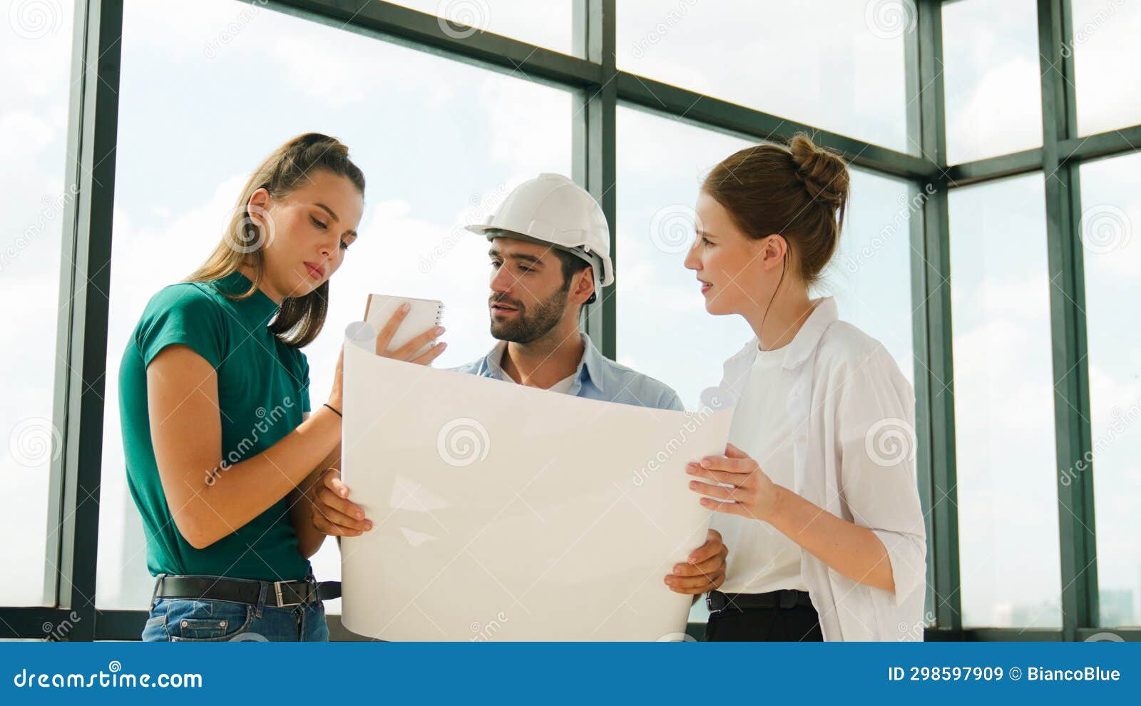 Engineer Team Talk about Design while Manager Hold at Project Plan ...