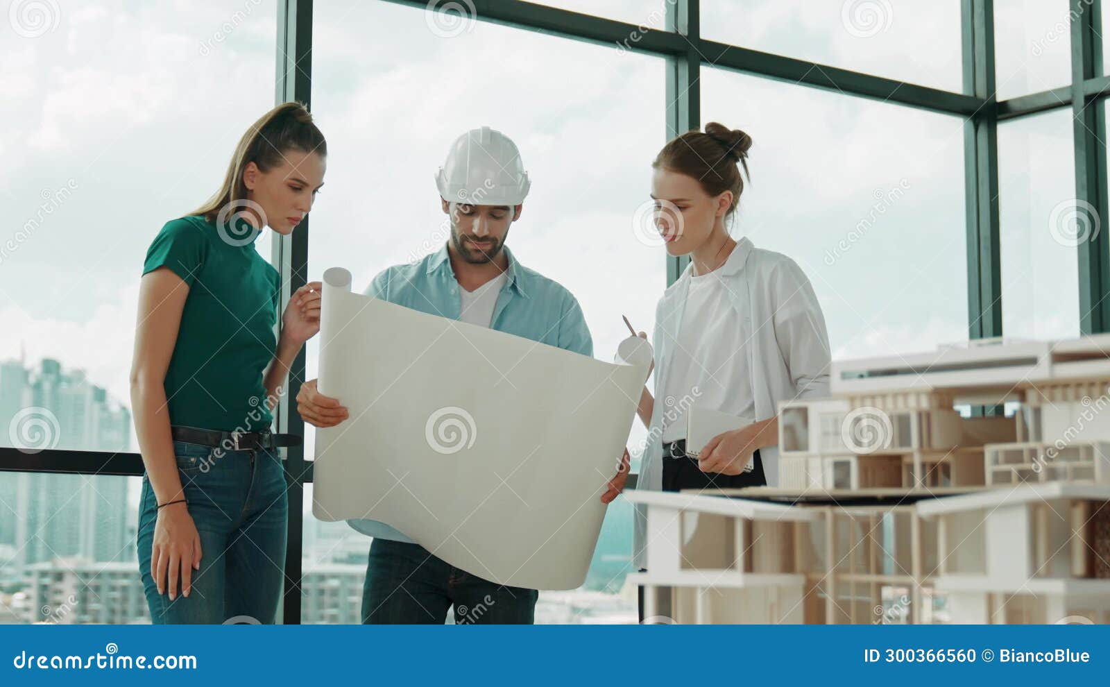 Engineer Team Talking while Look at Skyscraper and Reading at Plan ...