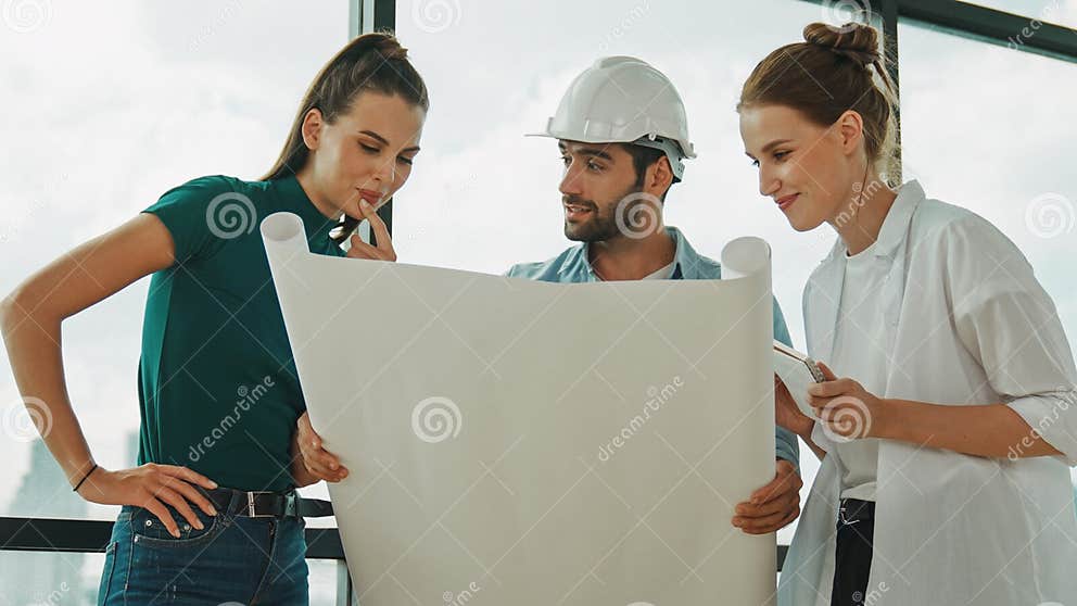 Engineer Team Thinking about Design while Looking at Project Plan ...