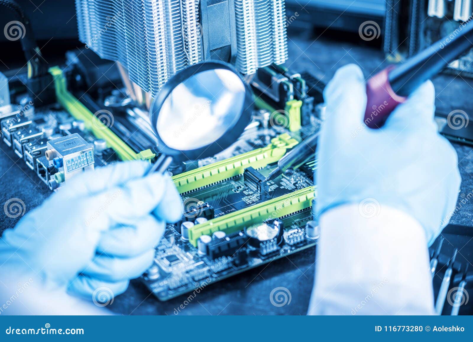 Engineer Technician Computers in Gloves on the Hands is Reviewing the ...
