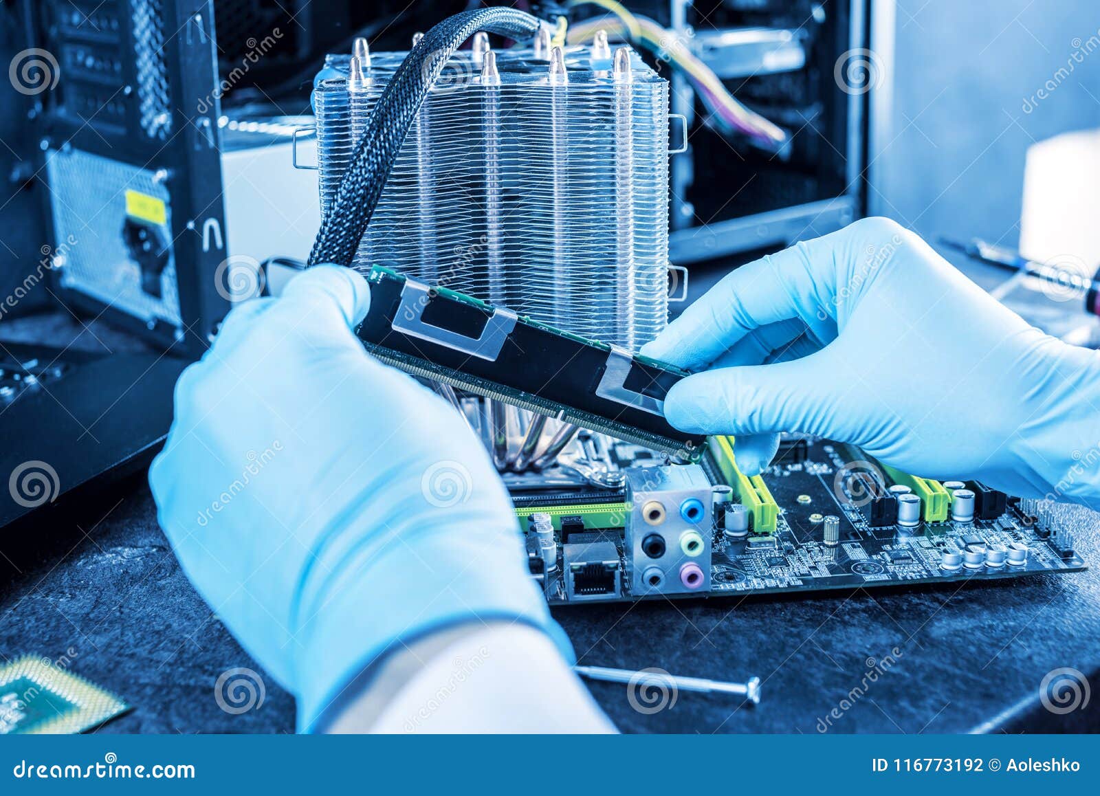 Engineer Technician Computers in Gloves on the Hands is Reviewing the ...