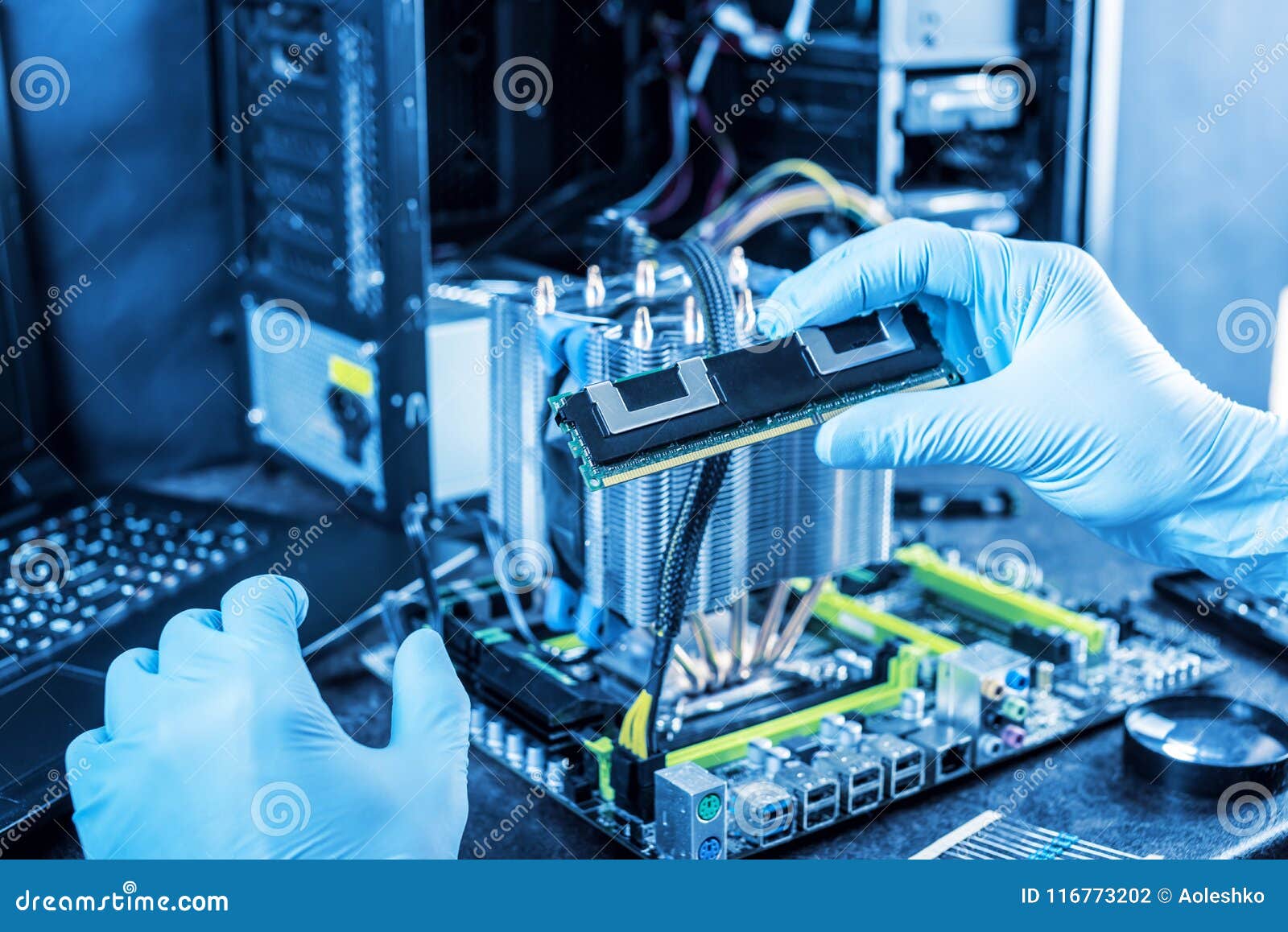 Engineer Technician Computers in Gloves on the Hands is Reviewing the ...
