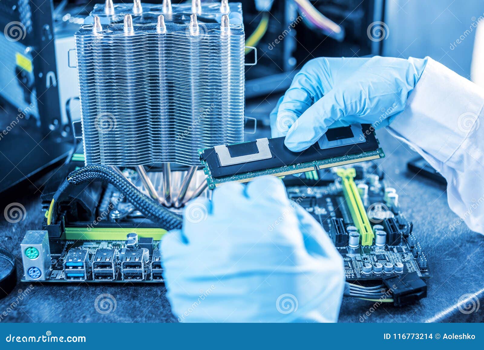 Engineer Technician Computers in Gloves on the Hands is Reviewing the ...