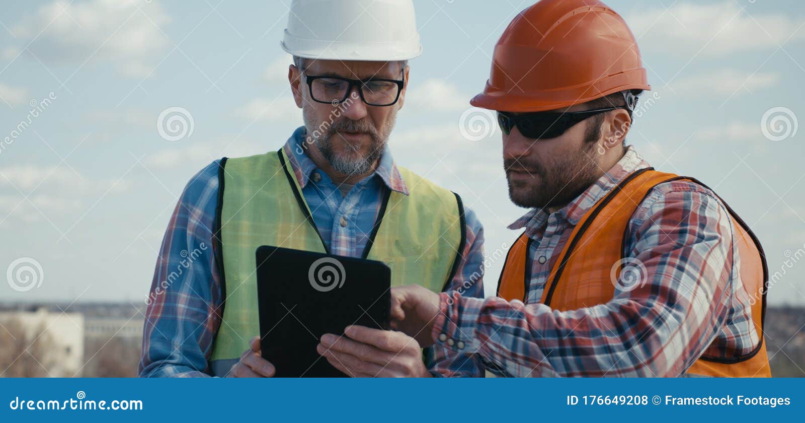 Engineer and Technician Discussing on Rooftop Stock Photo - Image of ...