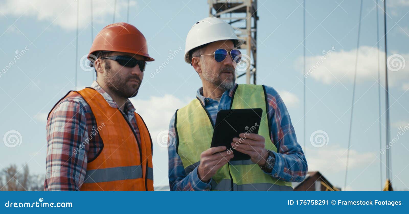 Engineer and Technician Discussing on Rooftop Stock Image - Image of ...