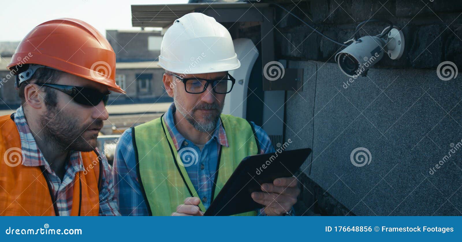 Engineer and Technician Discussing about Security Camera Stock Photo ...