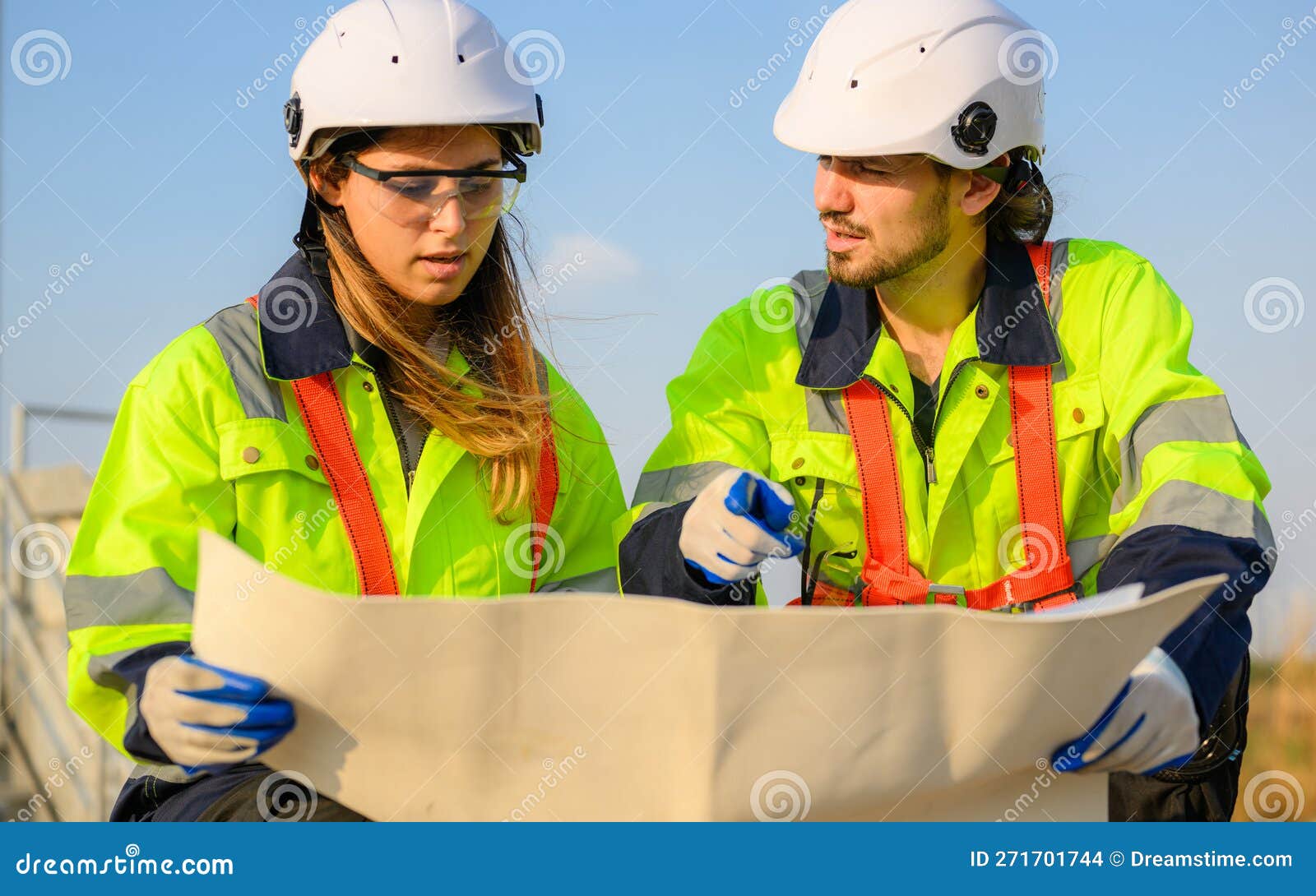 Engineer Technician with Safety Uniform Working at Wind Turbine Field ...