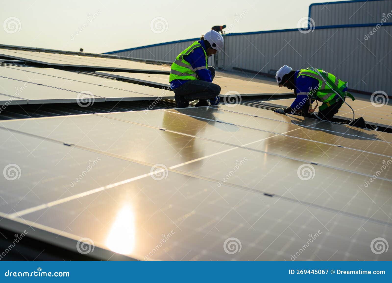 Engineer and Technician Using Laptop Checking Solar Panels System Stock ...