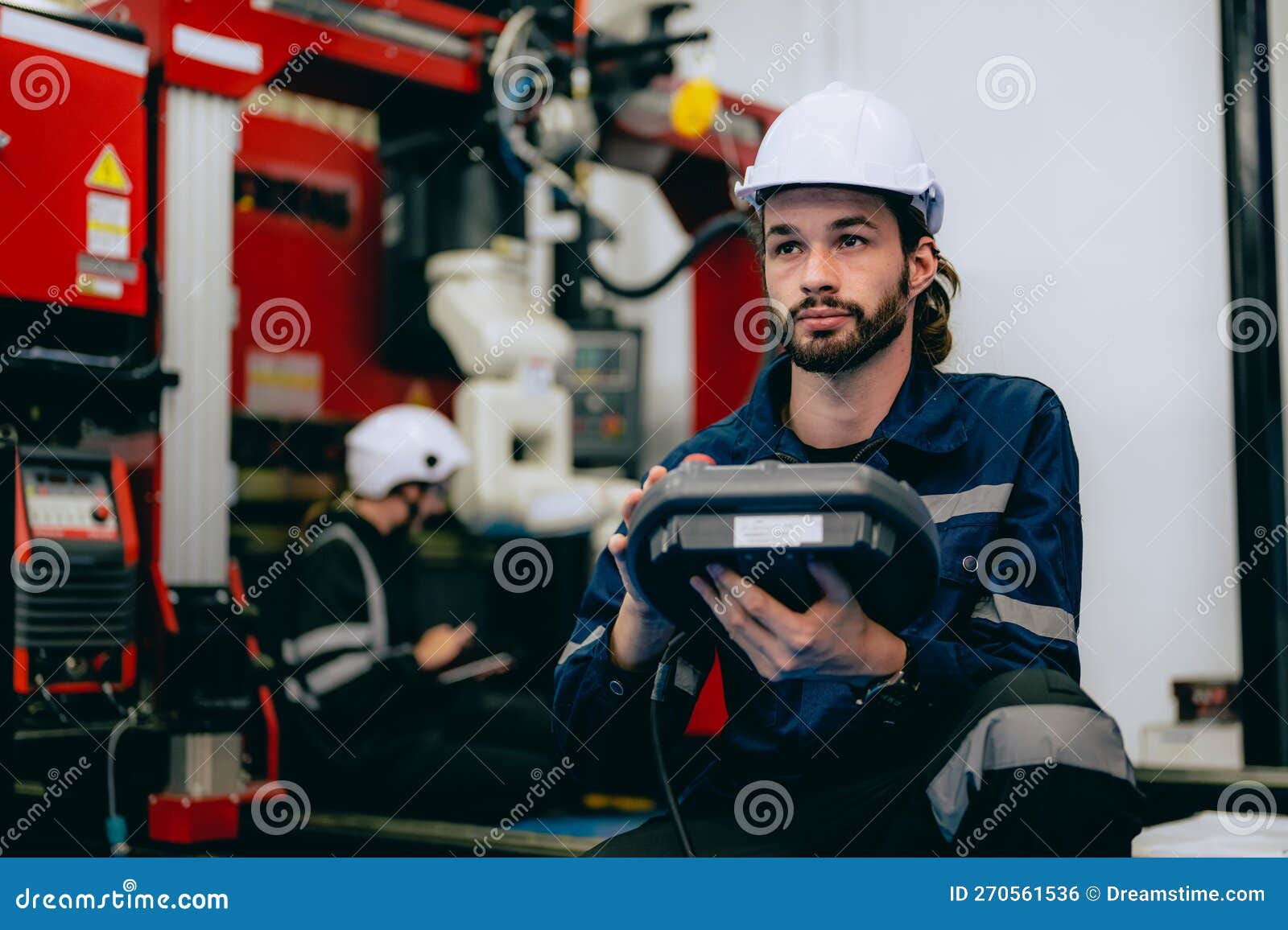 Engineer Technician Using Remote Controller Controlling Machinery Stock ...
