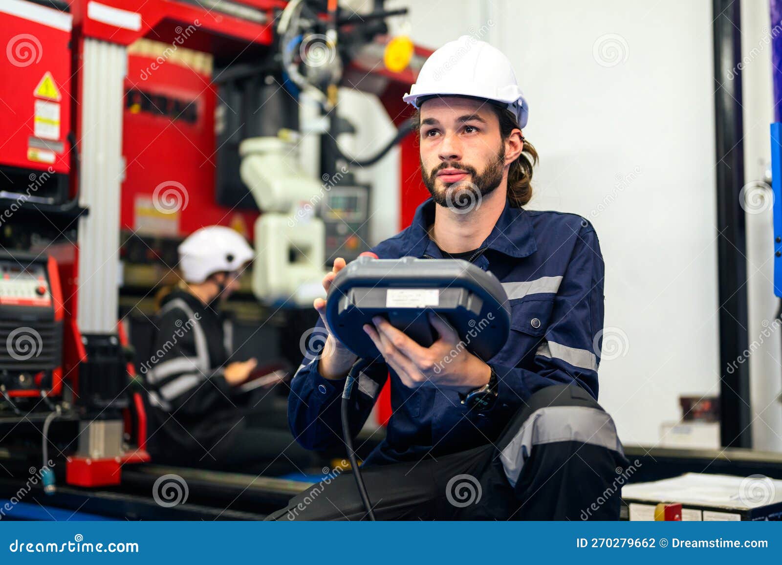 Engineer Technician Using Remote Controller Controlling Machinery Stock ...