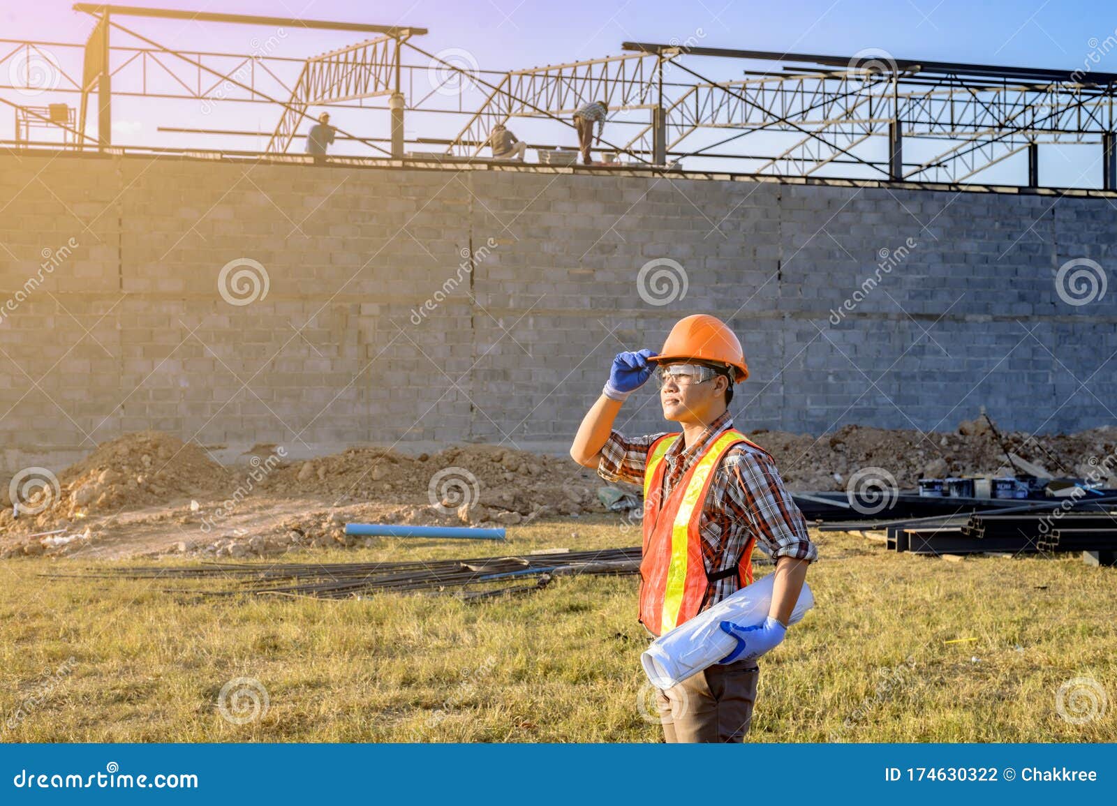 Engineer Technician Watching Team of Workers on High Steel Platform ...