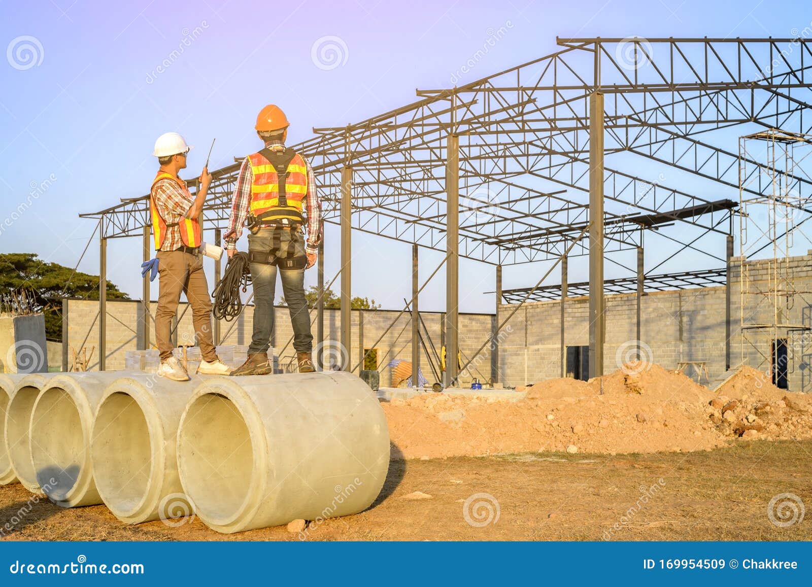 Engineer Technician Watching Team of Workers on High Steel Platform ...