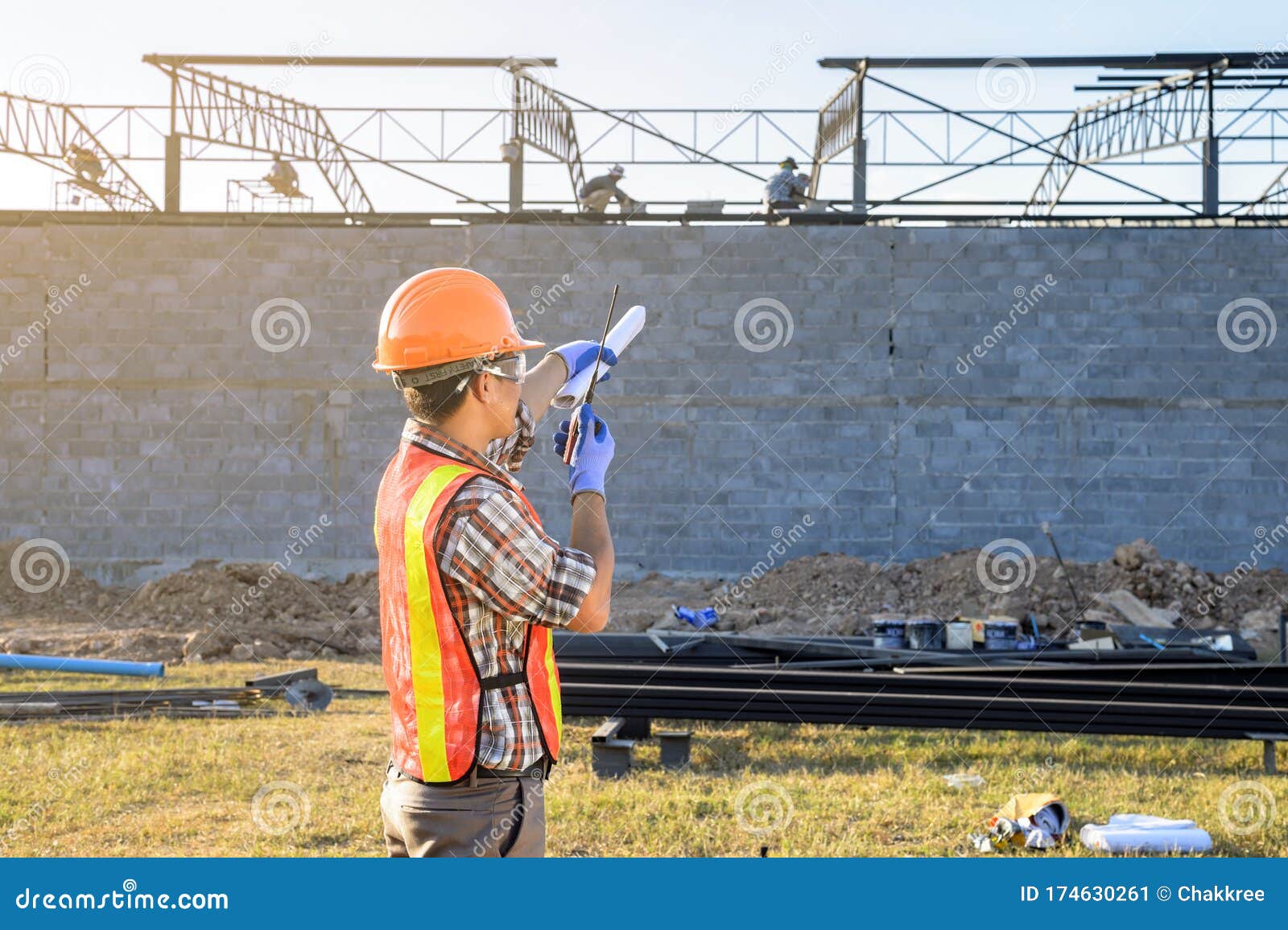 Engineer Technician Watching Team of Workers on High Steel Platform ...