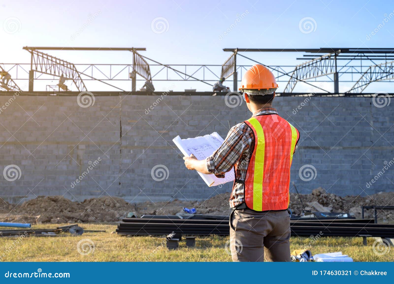 Engineer Technician Watching Team of Workers on High Steel Platform ...