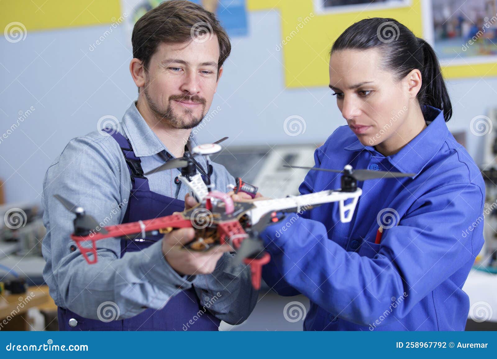 Engineer and Technician Working Together on Drone in Office Stock Photo ...