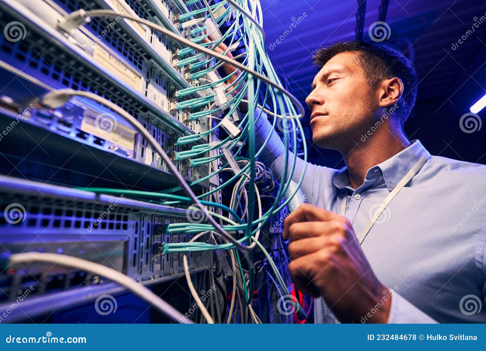 Engineer Testing Cable Connections on Network Server Stock Photo ...