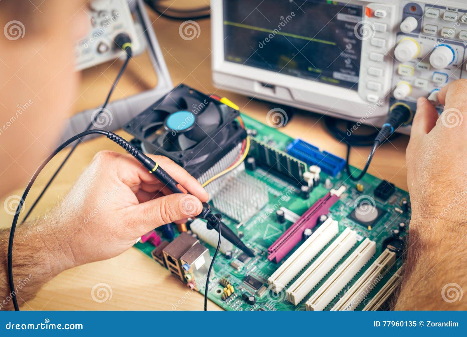 Engineer Tests Electronic Components with Oscilloscope in the Service ...