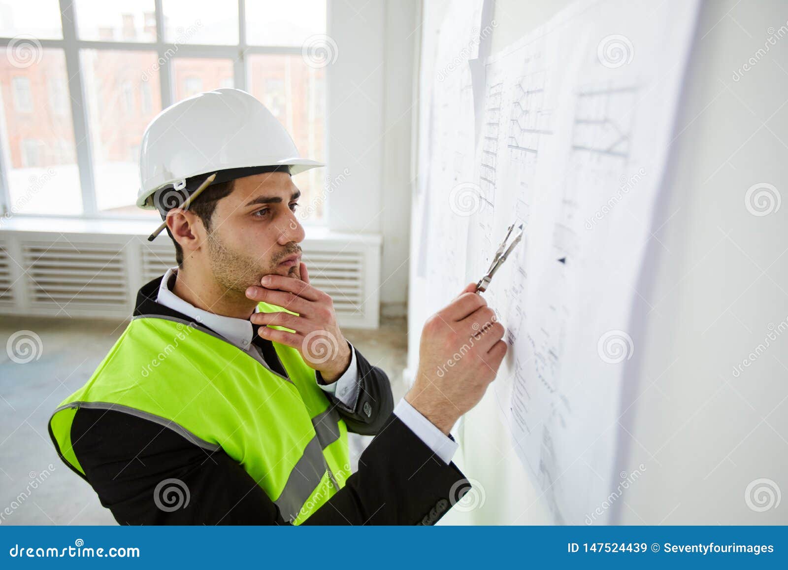 Engineer Thinking Over Plans Stock Image - Image of clothing ...