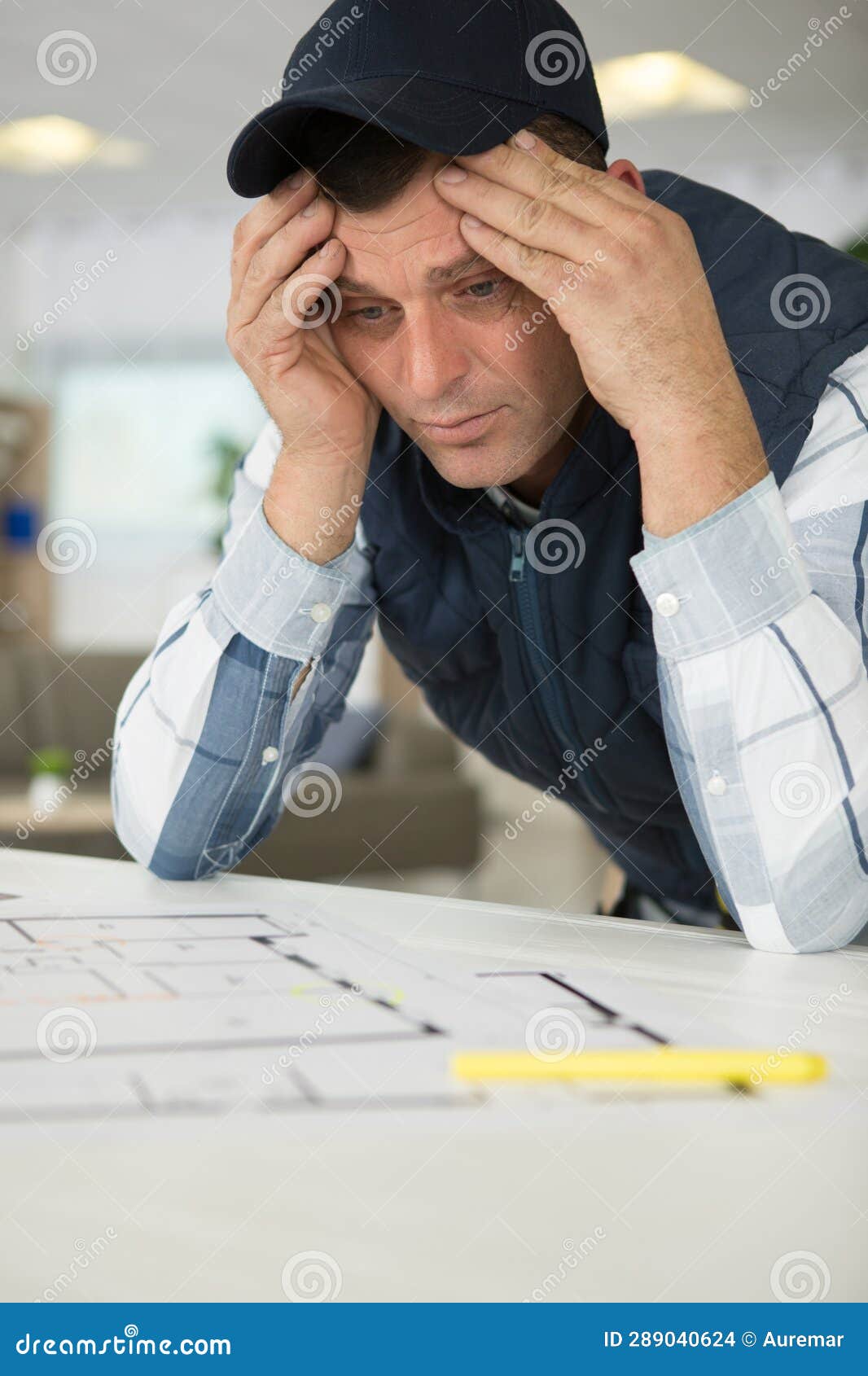 Engineer thinking at table stock photo. Image of work - 289040624