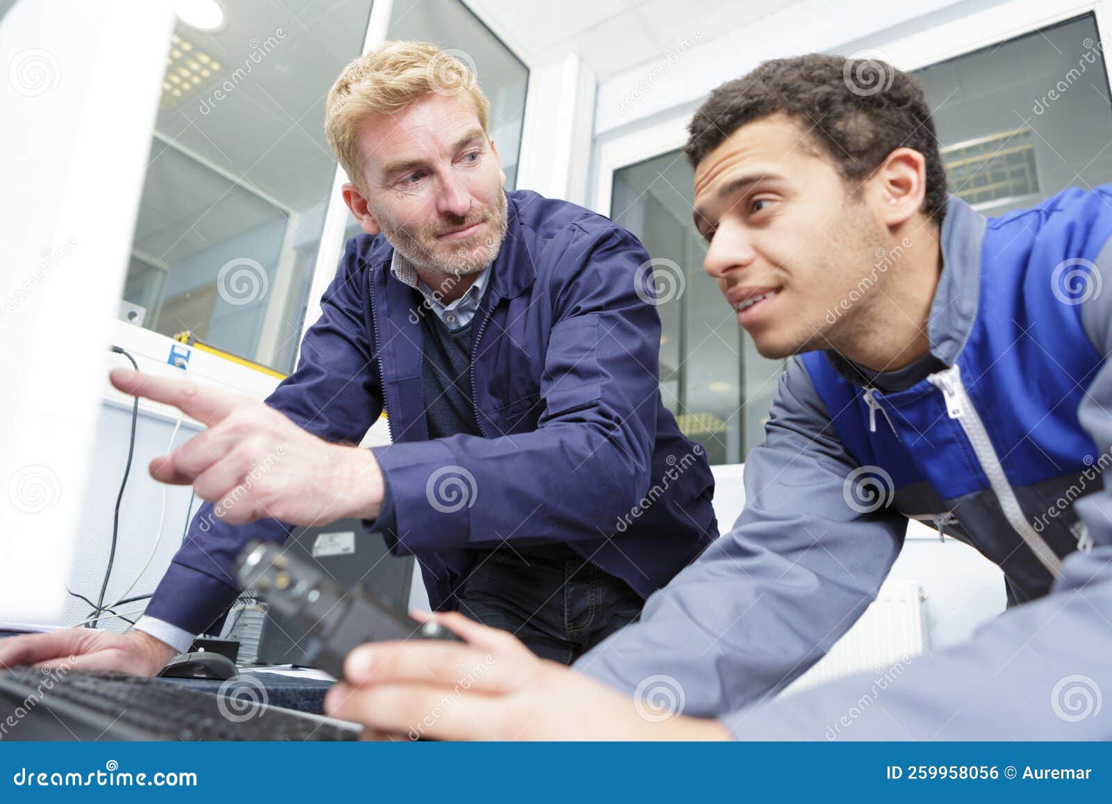 Engineer Training Apprentice Using Computer Stock Photo - Image of ...