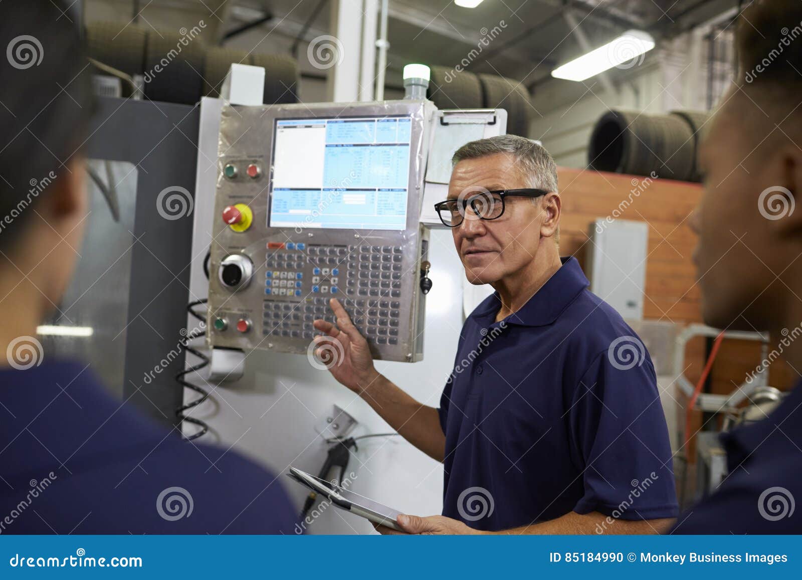 Engineer Training Apprentices on CNC Machine Stock Photo - Image of ...