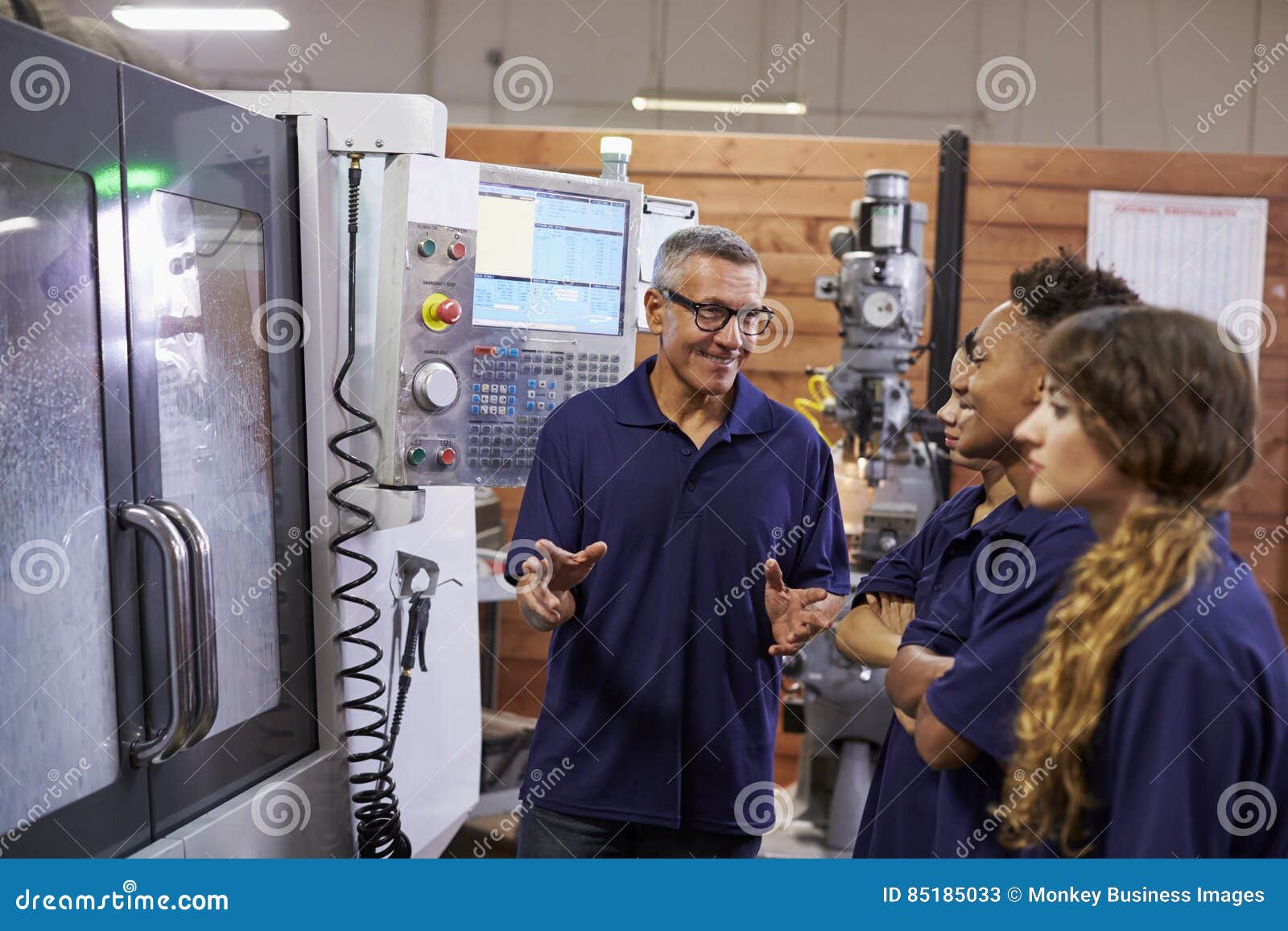 Engineer Training Apprentices on CNC Machine Stock Image - Image of ...