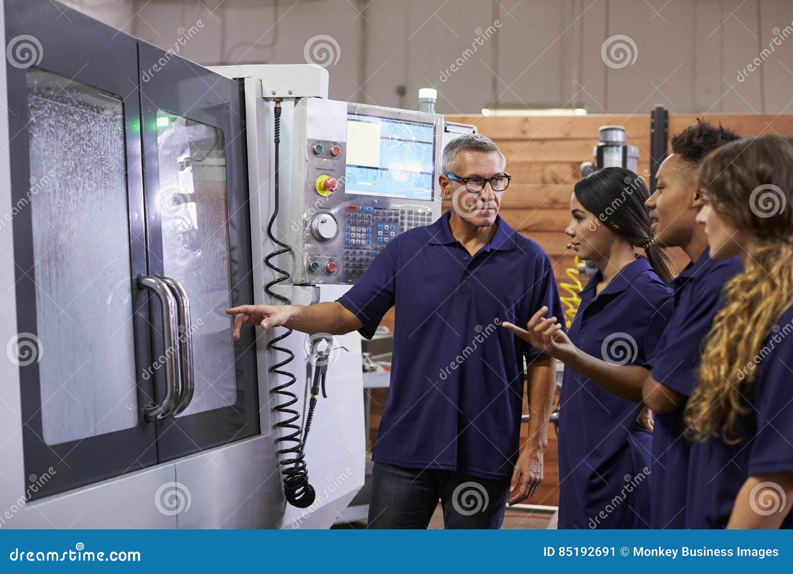 Engineer Training Apprentices on CNC Machine Stock Image - Image of ...