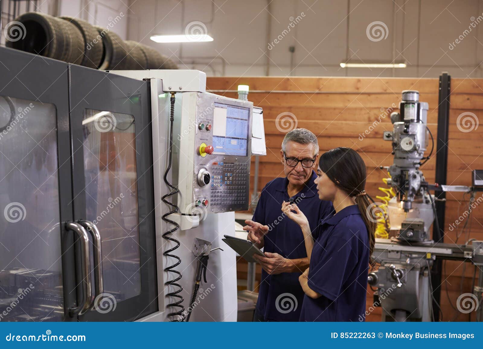 Engineer Training Female Apprentice on CNC Machine Stock Image - Image ...