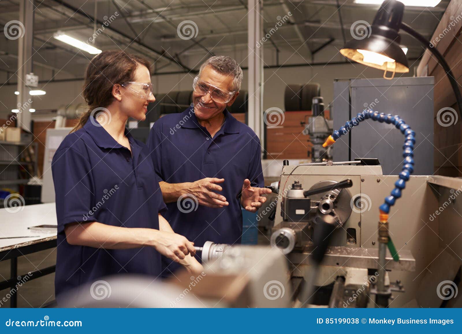 Engineer Training Female Apprentice on Milling Machine Stock Photo ...