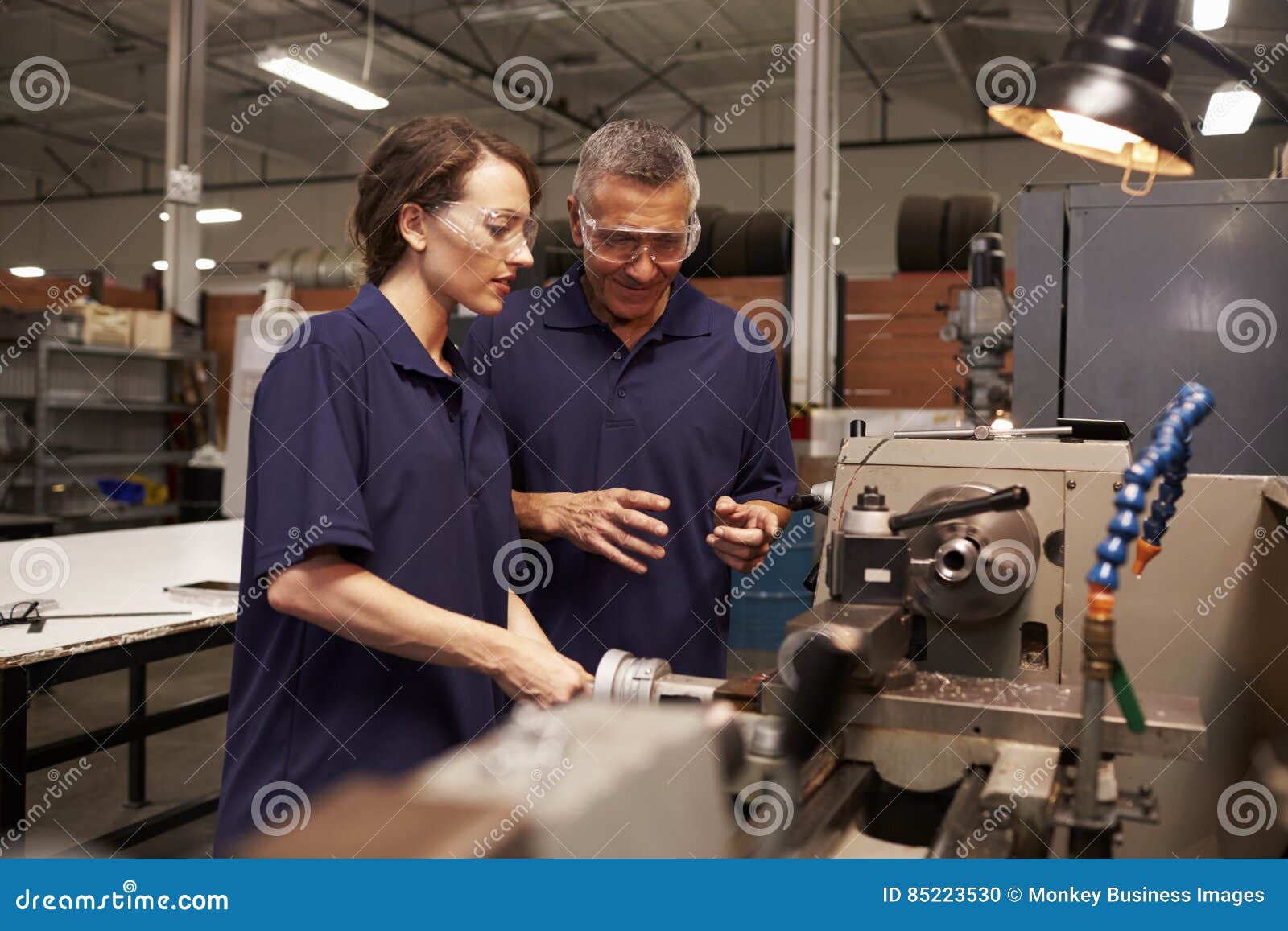 Engineer Training Female Apprentice on Milling Machine Stock Photo ...