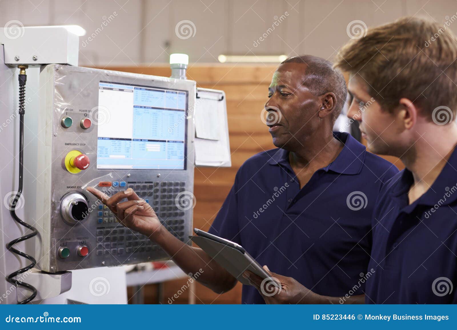 Engineer Training Male Apprentice On CNC Machine Royalty-Free Stock ...