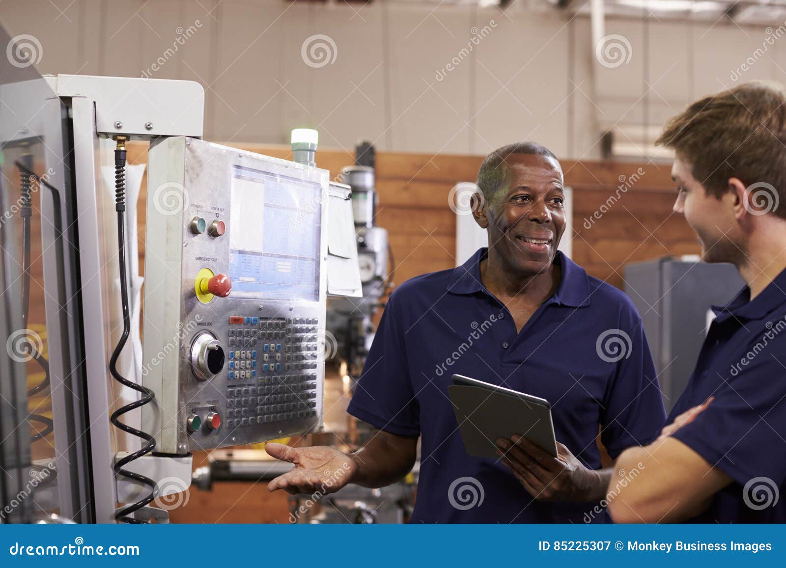 Engineer Training Male Apprentice on CNC Machine Stock Image - Image of ...