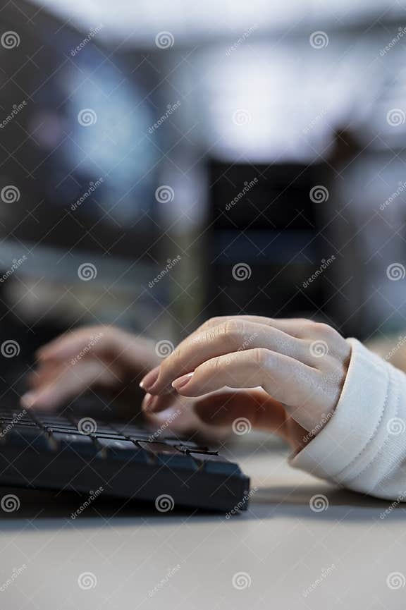 Close Up Of Employee In Server Farm Configuring And Testing Hardware