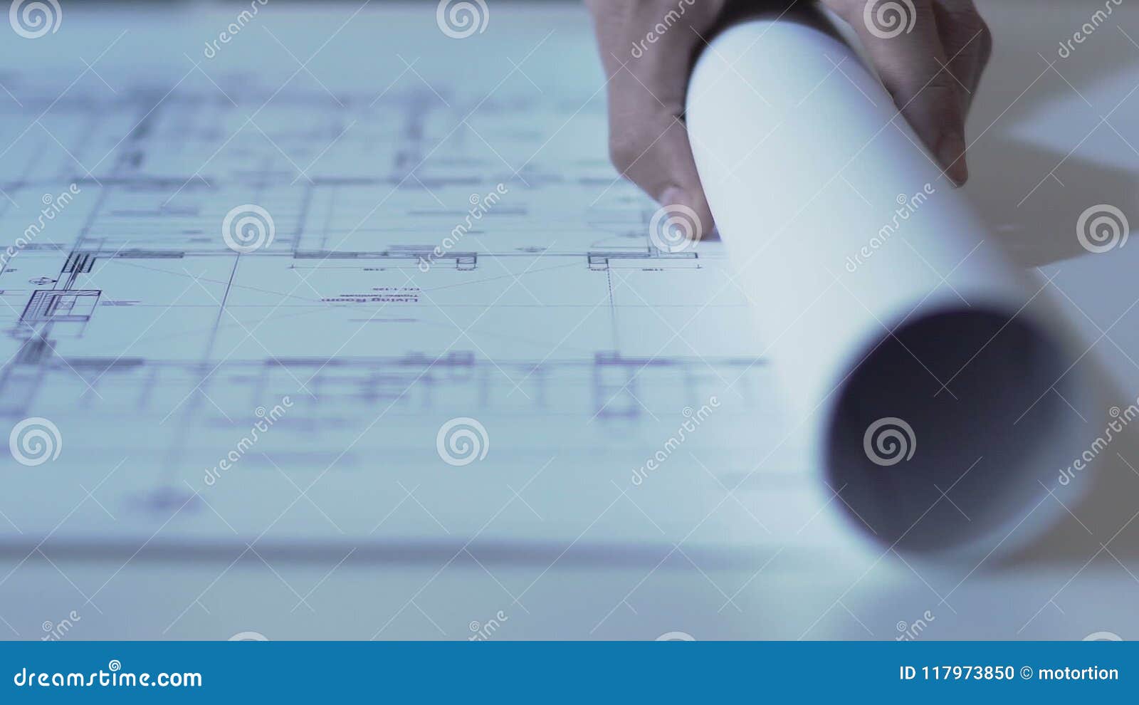 Engineer Unrolling Drawing of Building on Table at Design Office, Slow ...