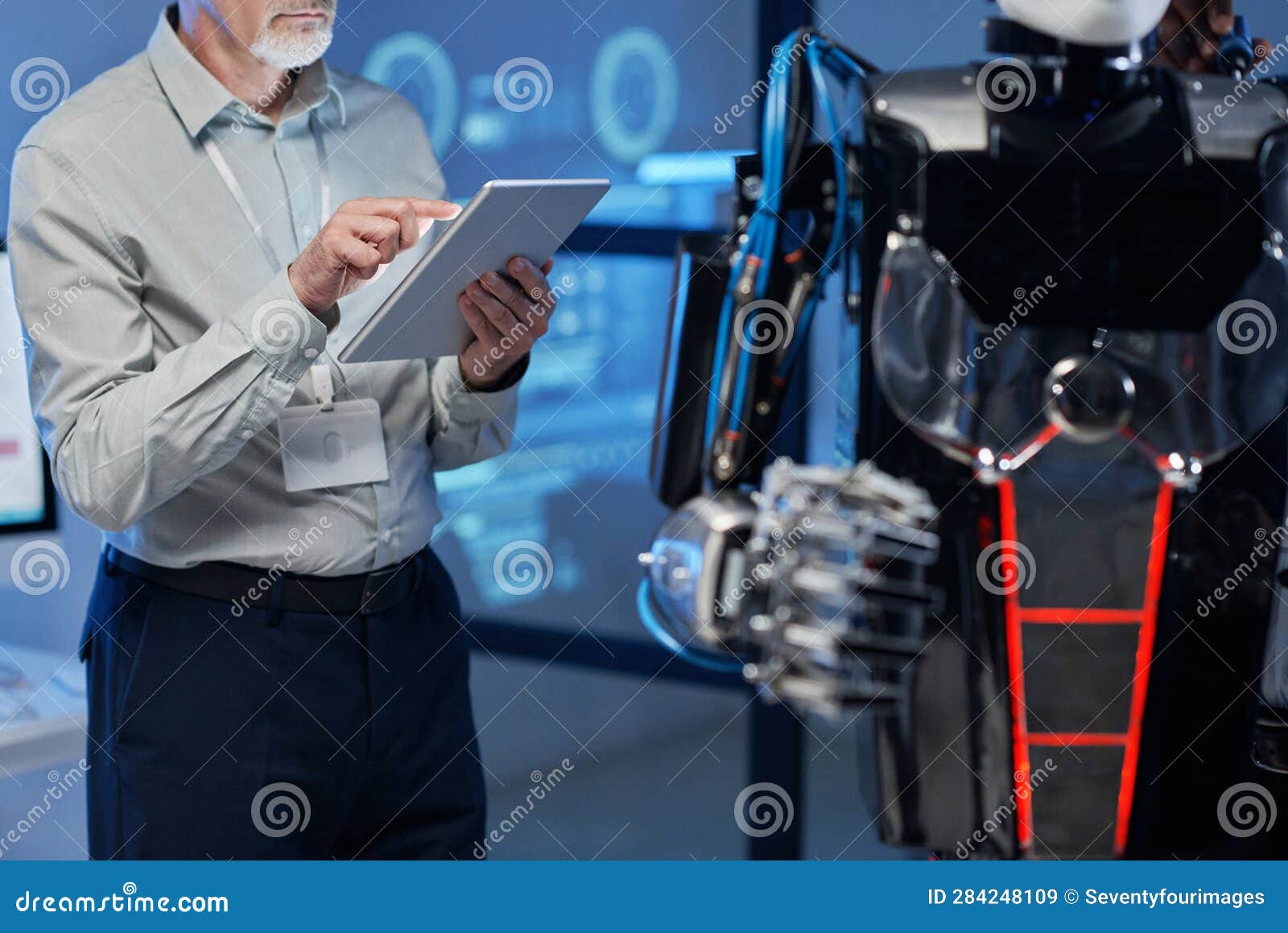 Engineer Using Digital Tablet To Connect with Robot Stock Image - Image ...