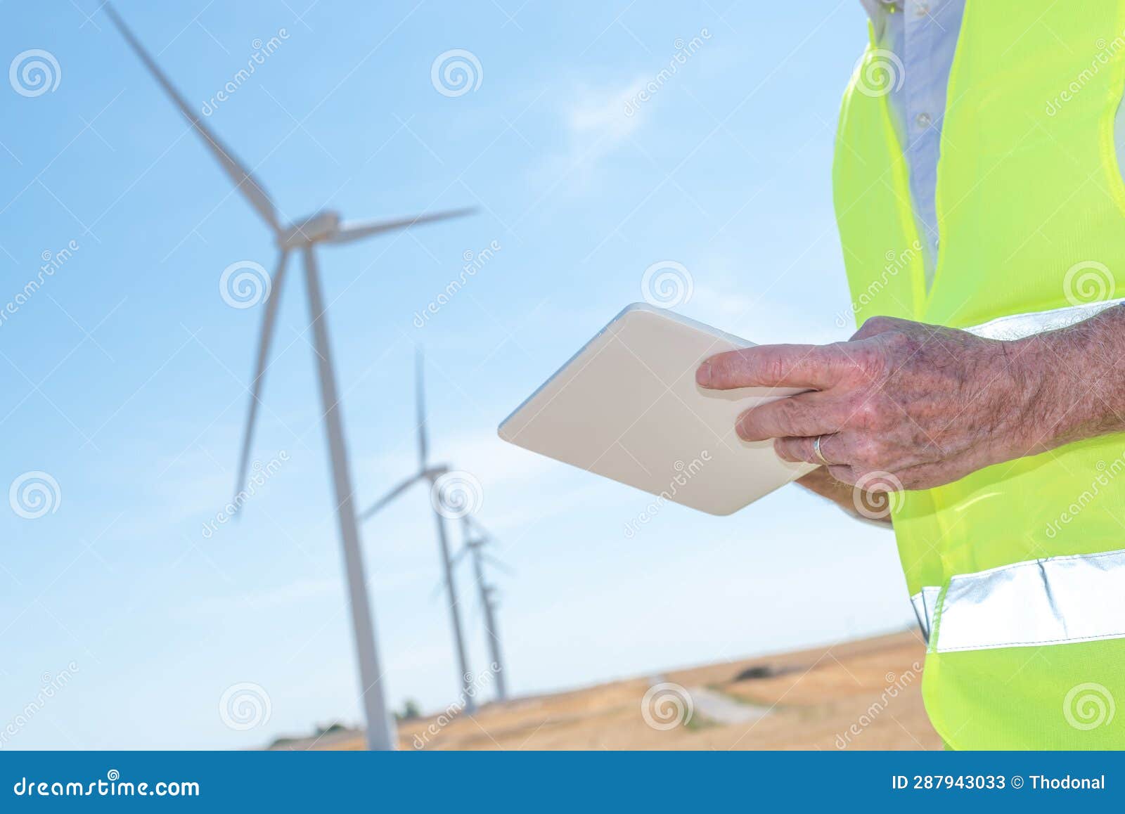 Engineer Using Digital Tablet for Wind Turbine Inspection Stock Image ...