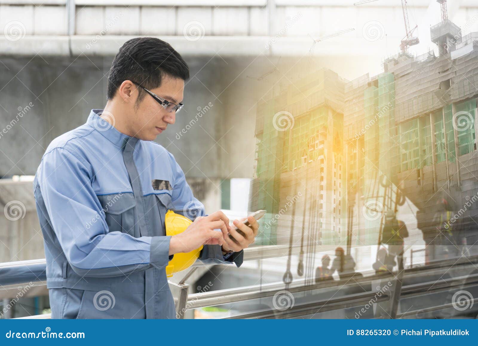 Engineer Using His Smartphone Stock Photo - Image of people, concept ...